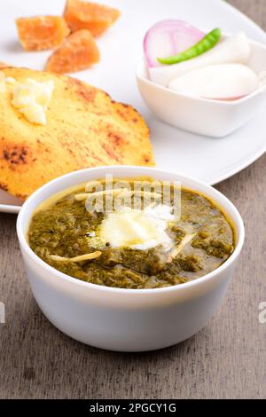 Sarson saag in bowl with white butter on white background Stock Photo ...