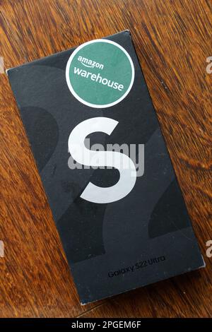 Amazon warehouse sticker on the box of a returned product Stock Photo ...