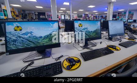 Desktop computers sit on a desk in a school computer lab Stock Photo ...