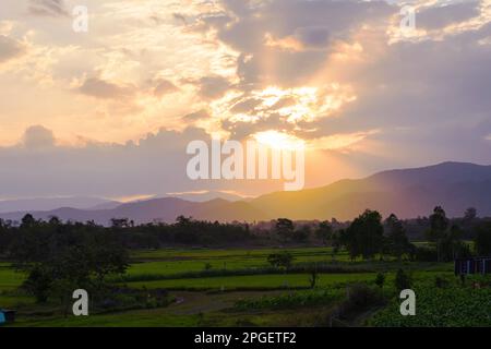Inspirational landscape of distant ridge and agricultural fields in ...