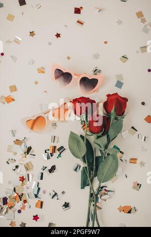 Bouquet of flowers with heart shapes on wooden table Stock Photo - Alamy