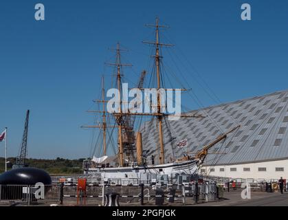 View across the dockyard towards HMS Gannet, a Victorian Royal Navy ...