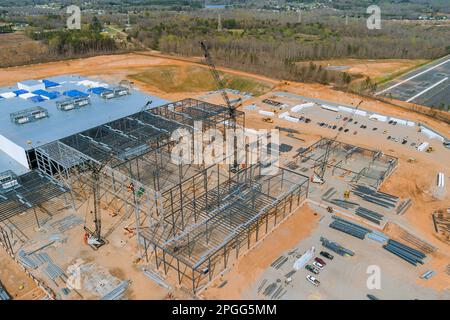 Crawler cranes are used for construction of metal steel framing beams ...