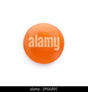 One orange cough drop isolated on white Stock Photo - Alamy