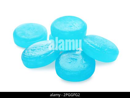 Many light blue cough drops on white background Stock Photo - Alamy