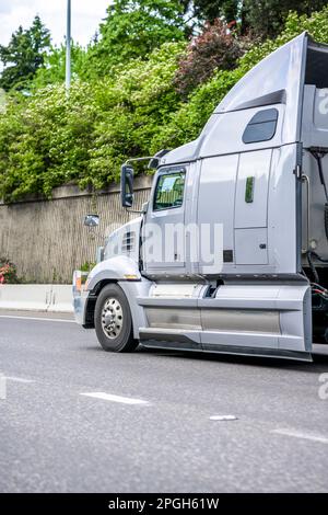 Big rig classic powerful gray day cab semi truck tractor with roof ...