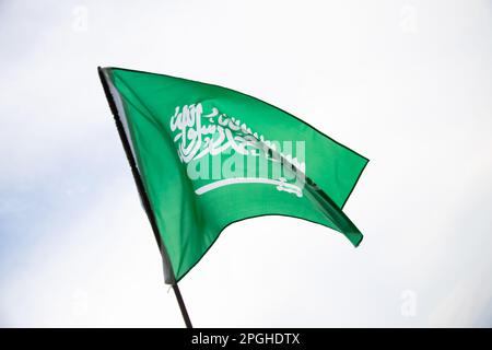 Saudi Arabia flag, Statement translation: There is no God but Allah ...