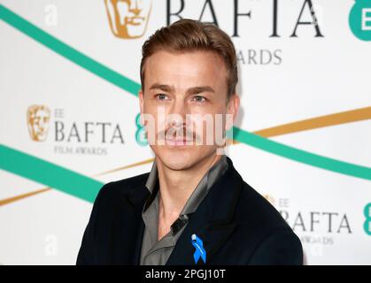 Albrecht Schuch attending the EE BAFTA Film Awards 2023 at The Royal ...