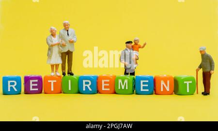 A colorful representation of retirement with miniature figures ...