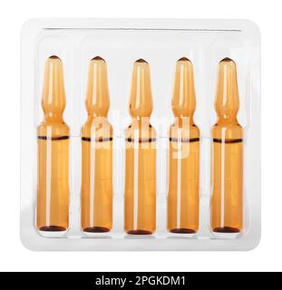 Glass ampoules with pharmaceutical product in tray on white background ...