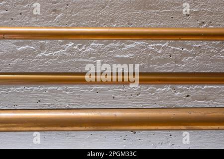 Three copper pipe side by side Stock Photo - Alamy