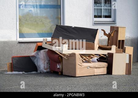 Bulky waste on a sidewalk Stock Photo - Alamy