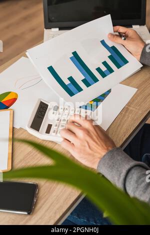 Businessman doing his calculations Stock Photo - Alamy