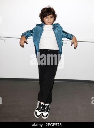 Miami, FL, USA - March 23, 2024: Crowds of youth people waiting to get ...