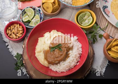 Peruvian food buffet table asado con peru beef stew with mashed ...