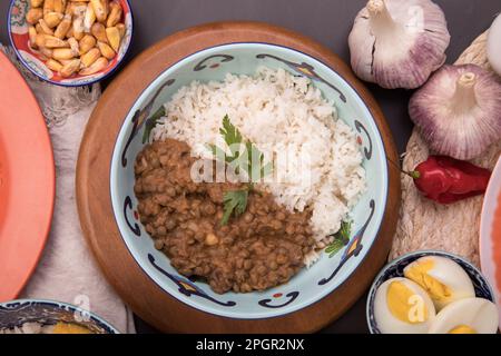 Peruvian food buffet table rice and lentils stew Stock Photo - Alamy