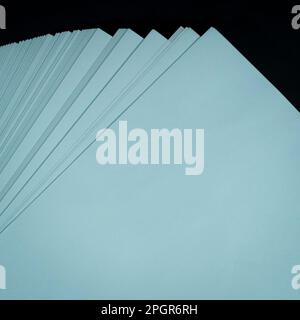 Stack of light blue paper sheets isolated on white with Clipping Path ...