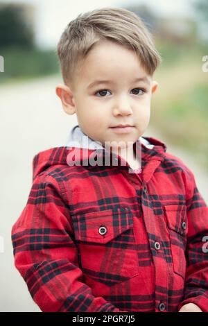 Handsome little boy outdoors Stock Photo - Alamy