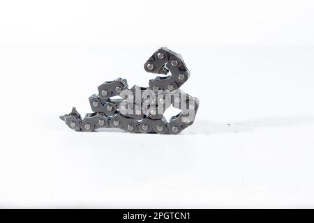 Old chains inside the motorcycle engine on a white background ...