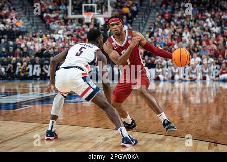 Arkansas guard Ricky Council IV (1) goes up to dunk over Troy forward ...