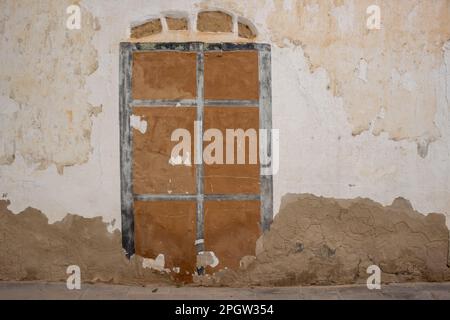 peeled white painting on a brick wall. weathered pattern texture ...