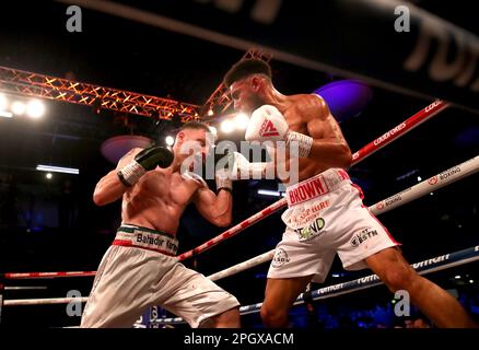 Niall Brown (right) and Bahadur Karami in action during their ...