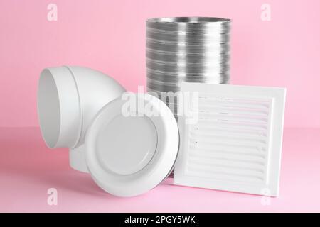 Parts of home ventilation system on yellow background Stock Photo - Alamy