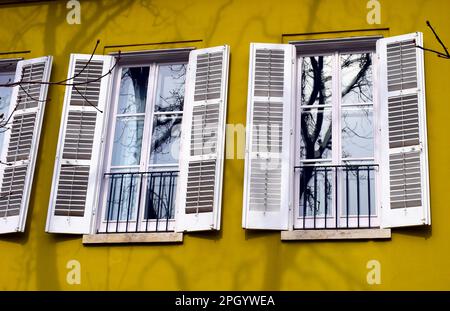 white steel picket balustrade. old French balcony. vertical white wood ...