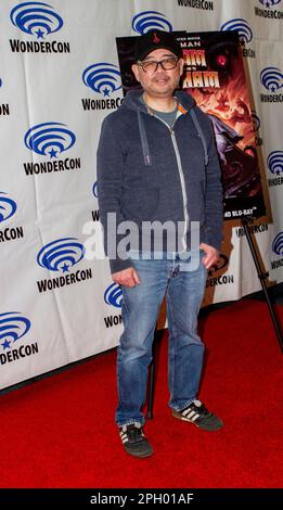 Sam Liu arrives at the press room for "Batman: The Doom That Came To ...