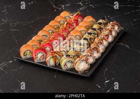 red caviar and salmon rolls with cottage cheese on the holiday table ...