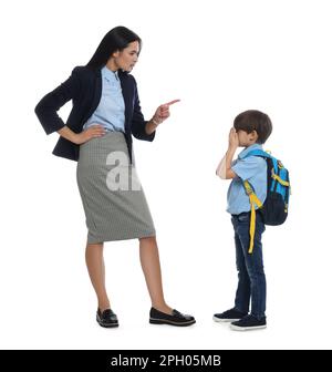 Teacher scolding pupil for being late in classroom Stock Photo - Alamy