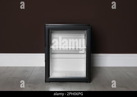 Empty mini bar near brown wall indoors, space for text Stock Photo - Alamy