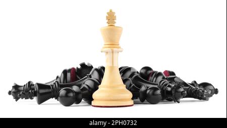 King among fallen chess pieces on white background Stock Photo - Alamy