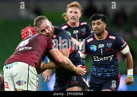 Harry Wilson of the Reds (left) tackles Brynard Stander of the Force ...