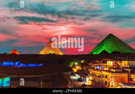 The Great Pyramid complex enlighted at night, Giza, Egypt Stock Photo ...