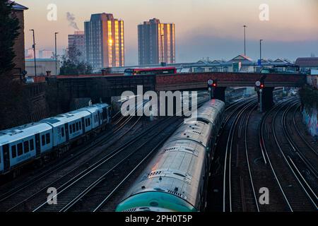 Sunrise reflected on buildings at Clapham Junction station Stock Photo ...