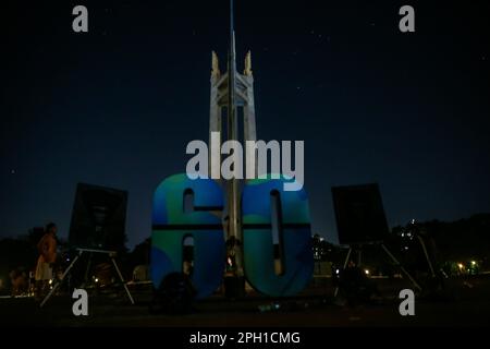 Earth hour 2023 event. Earth planet with sunlight in outer space. Turn ...