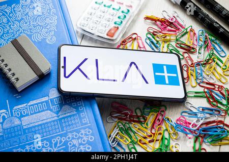 In this photo illustration, a KLA logo is seen displayed on a ...