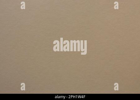 Camel brown colored tinted paper sheet background. Light yellowish ...