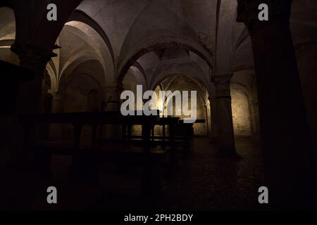 Crypt with benches and altar in the old dome of Brescia Stock Photo - Alamy