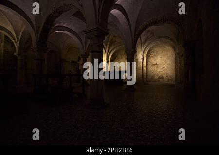 Crypt with benches and altar in the old dome of Brescia Stock Photo - Alamy