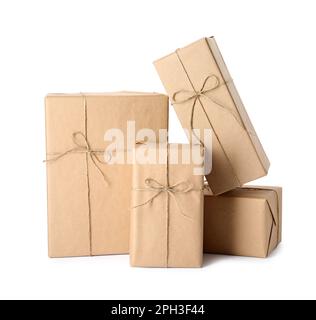Parcels wrapped with kraft paper and twine on white background Stock ...