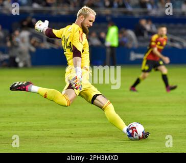 Seattle Sounders goalkeeper Stefan Frei, right, leaps to push the ball ...