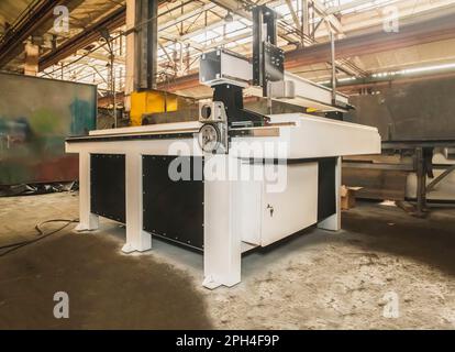 Unfinished new CNC machine in the factory Stock Photo - Alamy