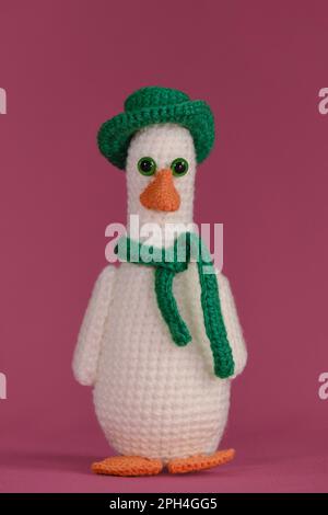 Portrait of a doll with a white knitted scarf on her head Stock Photo ...