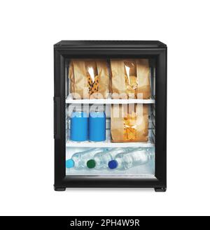 Mini bar filled with food and drinks near white wall indoors Stock ...