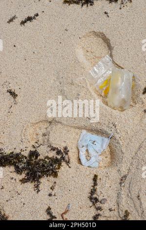 Footprint, human footprint with plastic waste Stock Photo - Alamy