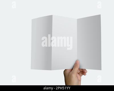 DL Tri-Fold Brochure with Hand Stock Photo - Alamy