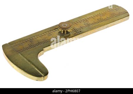 brass caliper isolated on white background Stock Photo - Alamy