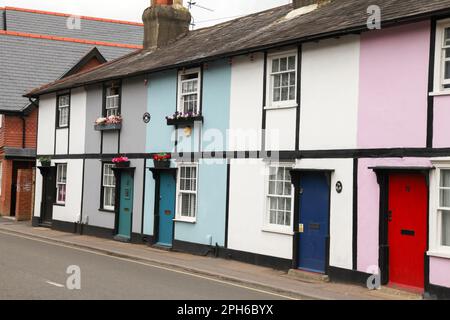 The colourful Woodfield Lane cottages in Ashtead, Surrey, England, UK ...